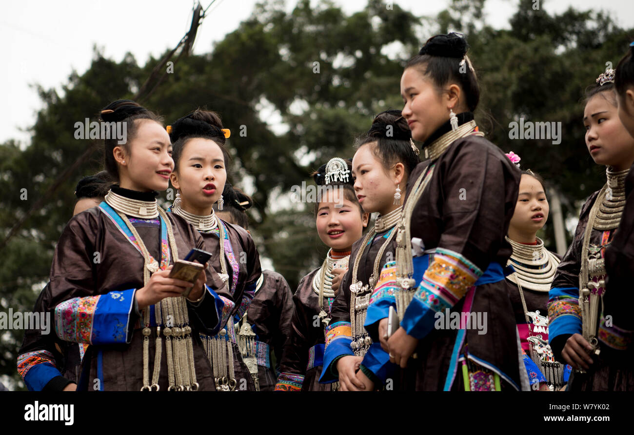 Chinese women of Dong ethnic group wearing traditional costumes are ...