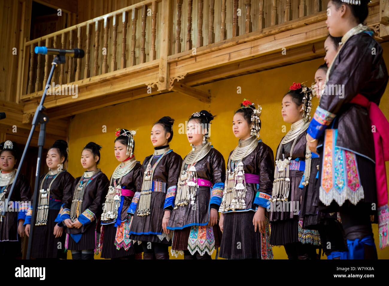 Chinese women of Dong ethnic group wearing traditional costumes perform ...