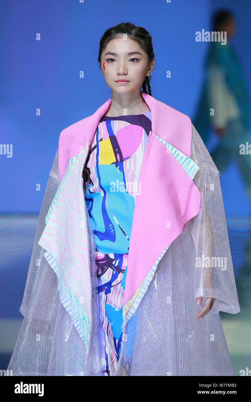 A model displays a creation by a graduate during a fashion show for ...