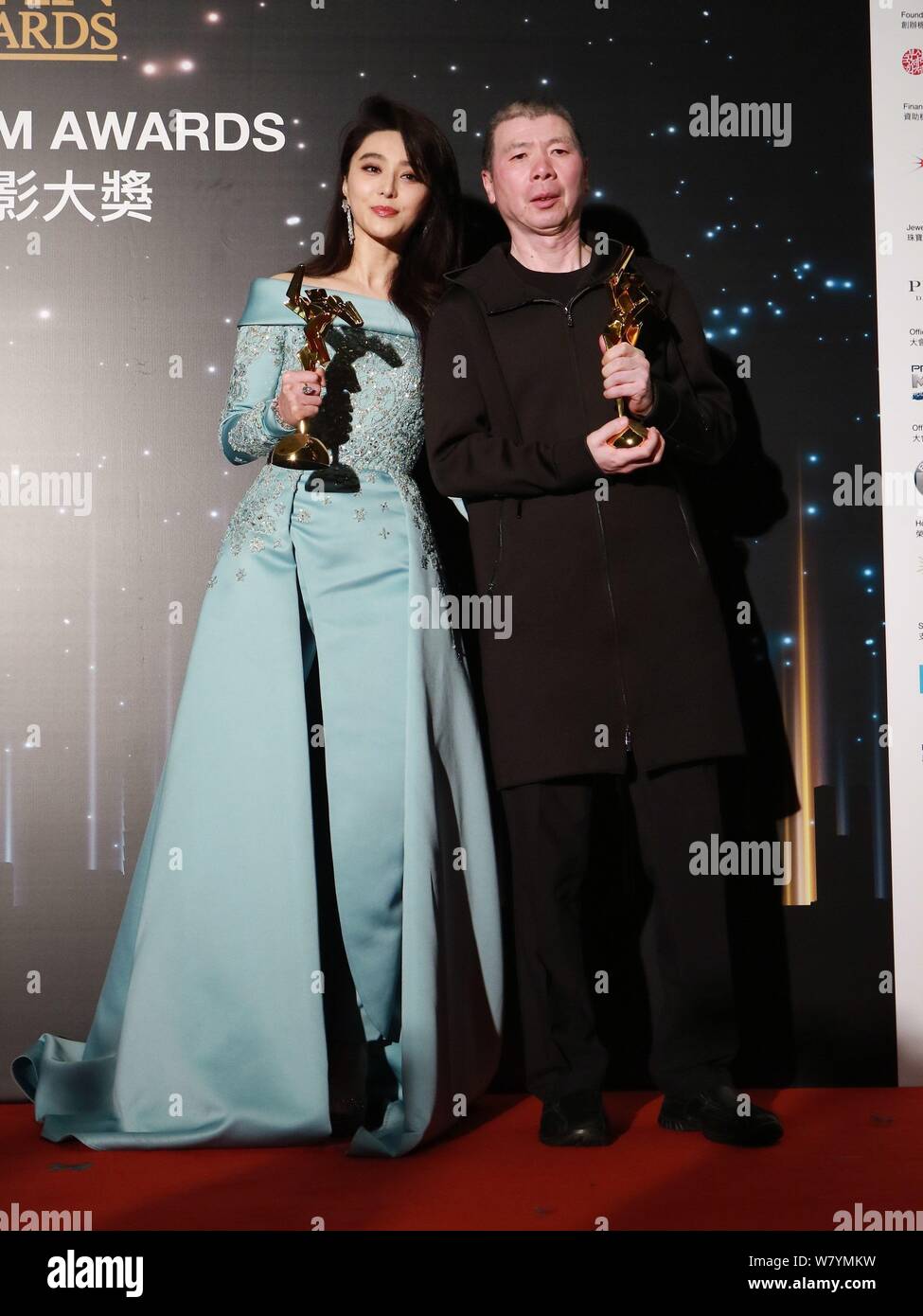 Chinese actress Fan Bingbing, left, and director Feng Xiaogang pose ...
