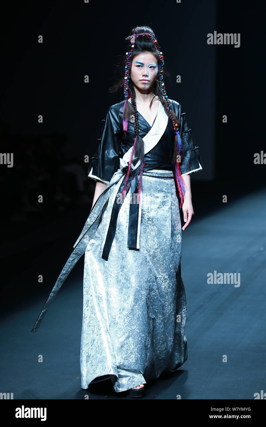 Models display new creations at the fashion show of AJ-NAMO during the ...