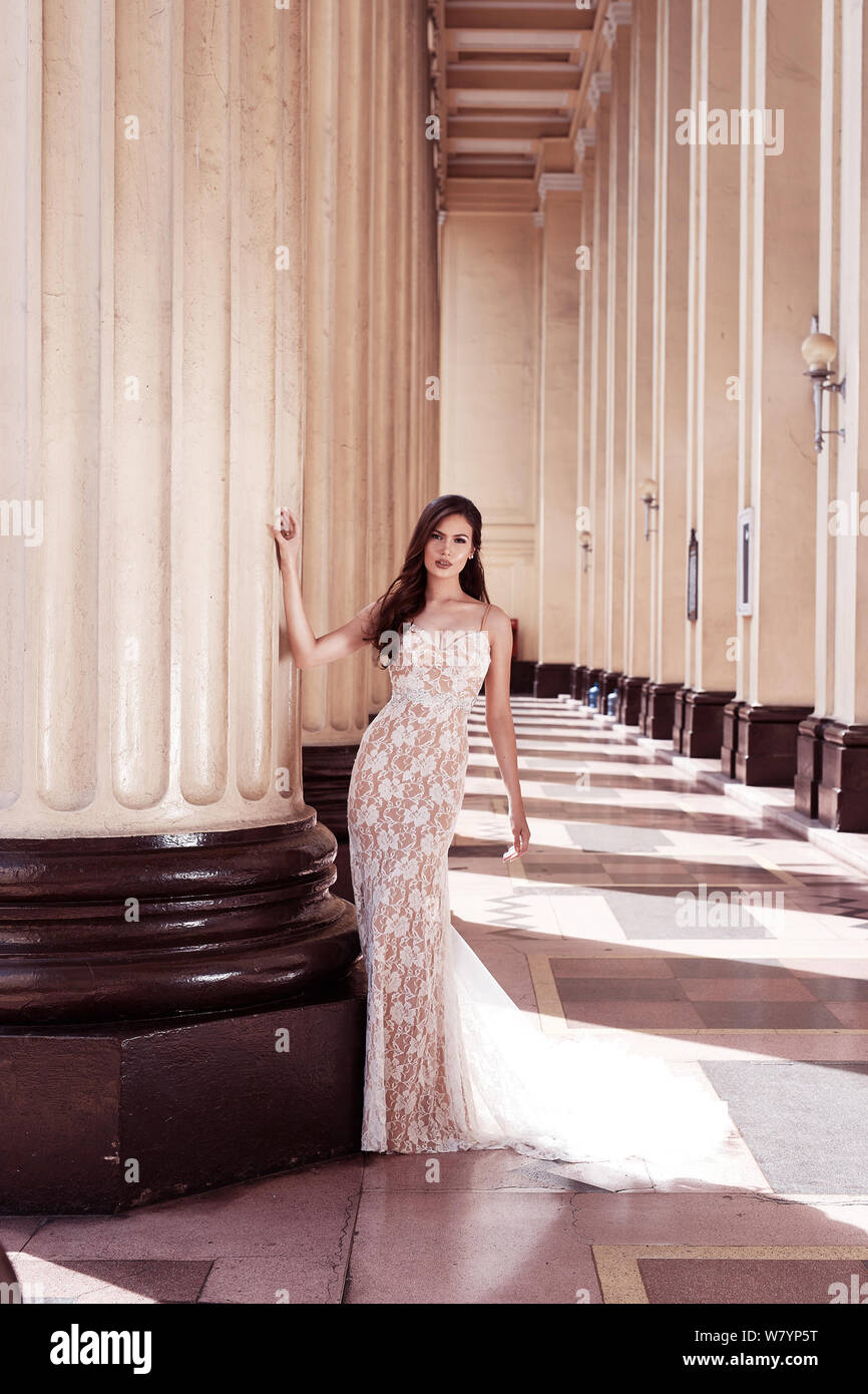 Slim Bridge Woman Posing in White Dress Stock Photo - Alamy