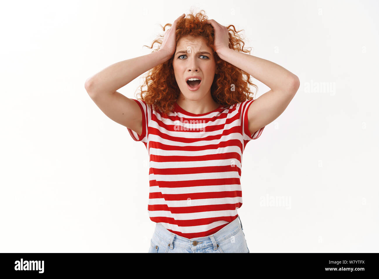 Oh no not again. Disappointed upset reckless curly-haired ginger woman ...