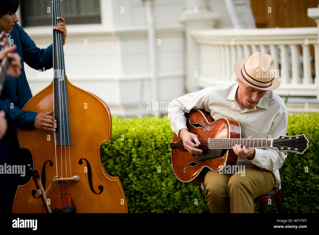 Small band playing outside Stock Photo - Alamy