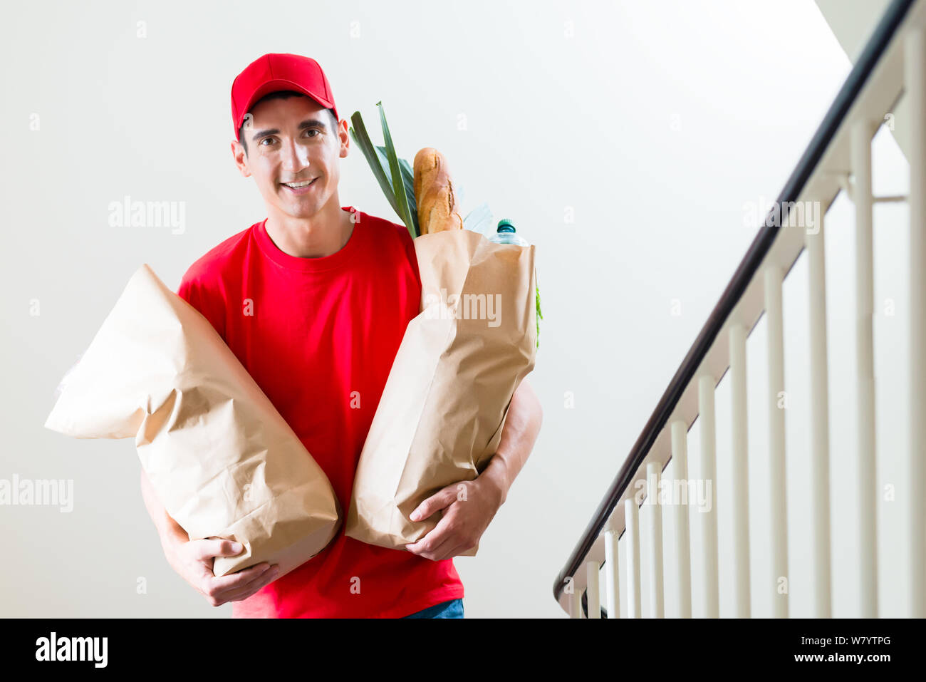 Delivering online grocery order Stock Photo - Alamy