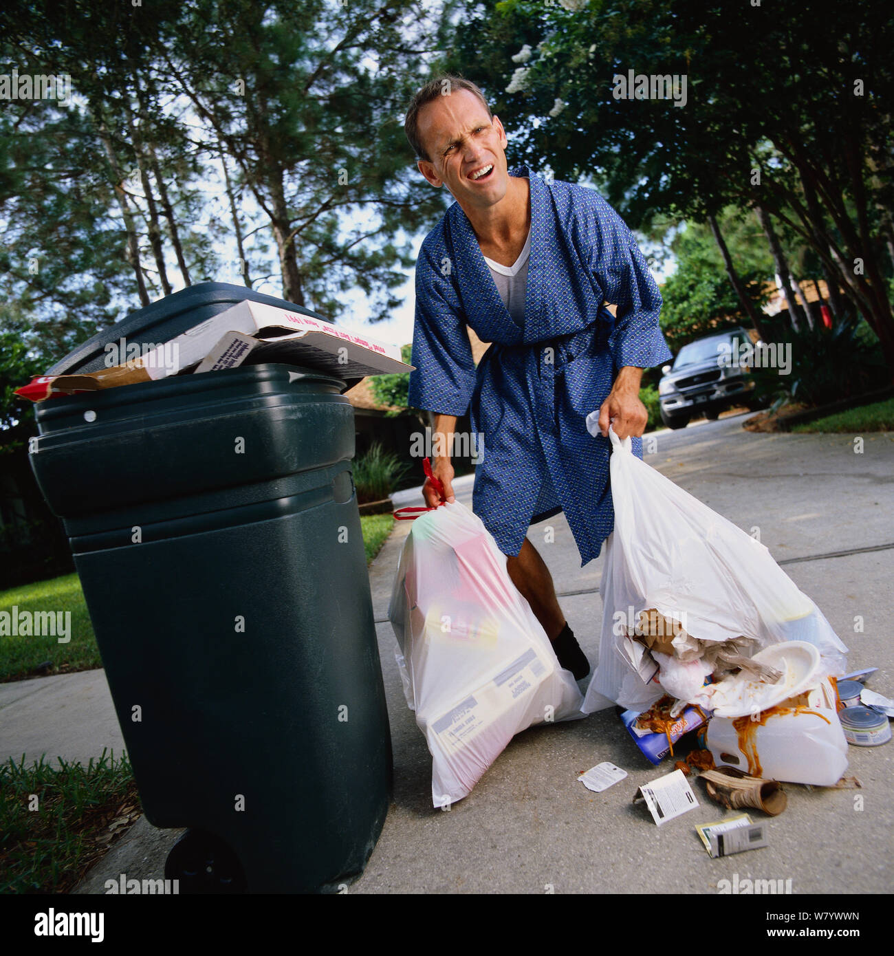 Tipped over bin hi-res stock photography and images - Alamy