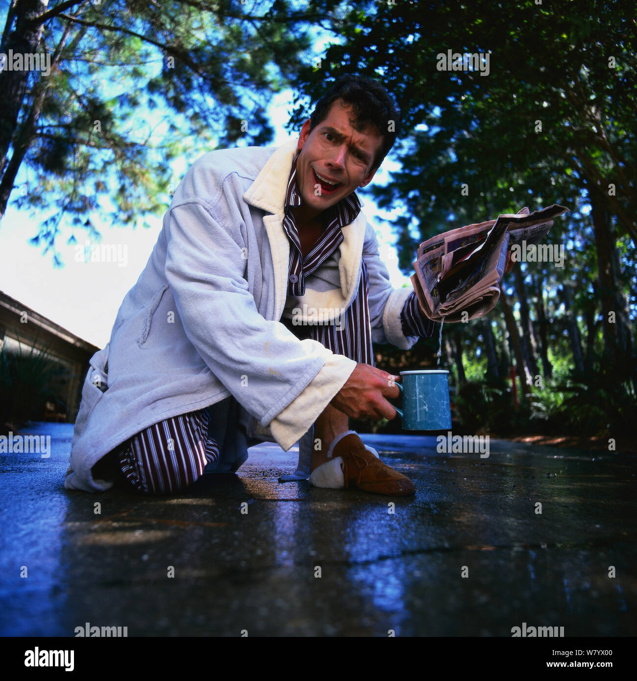 Working on his Sprinklers and getting splashed in the face Stock Photo ...