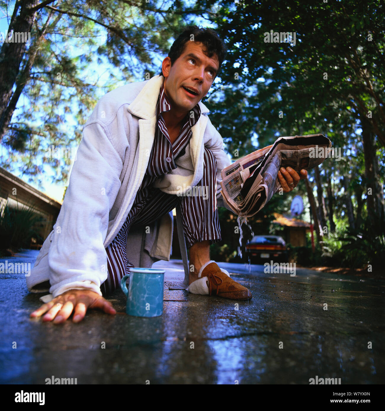 Working on his Sprinklers and getting splashed in the face Stock Photo ...