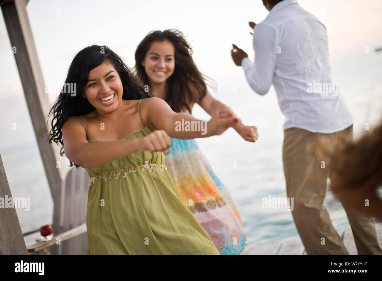 Two teenage girls dancing at a party Stock Photo - Alamy