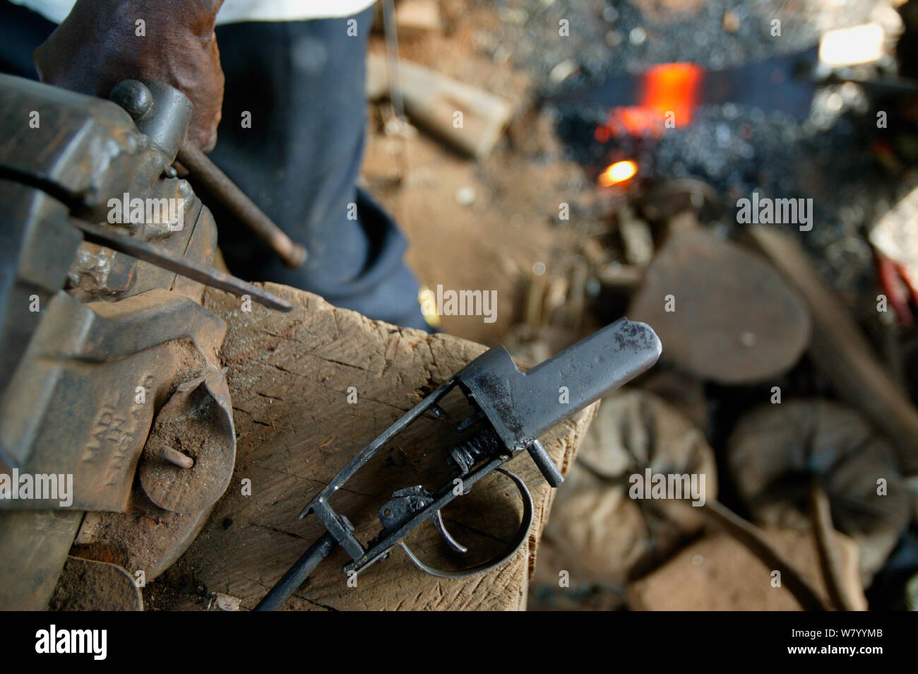 Blacksmith forging handgun, Boje Village, Cross River State, Nigeria ...