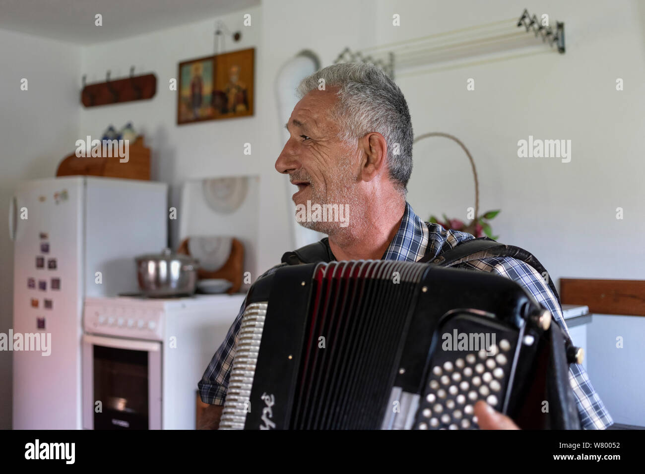 Man playing harmonica hi-res stock photography and images - Alamy