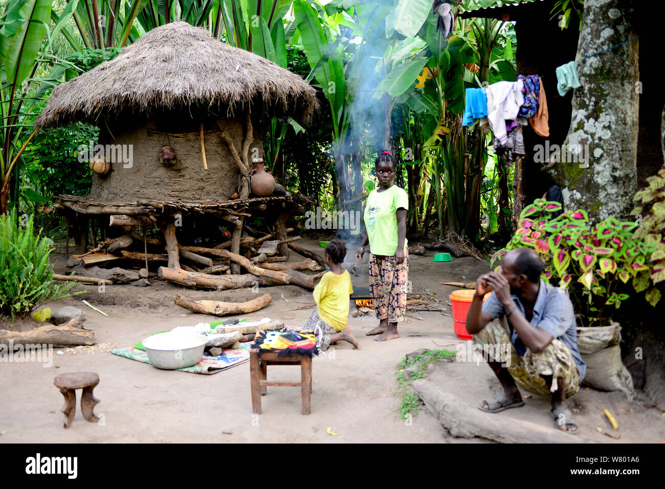 Ari village with family cooking outside house, Omo Valley. Ethiopia ...