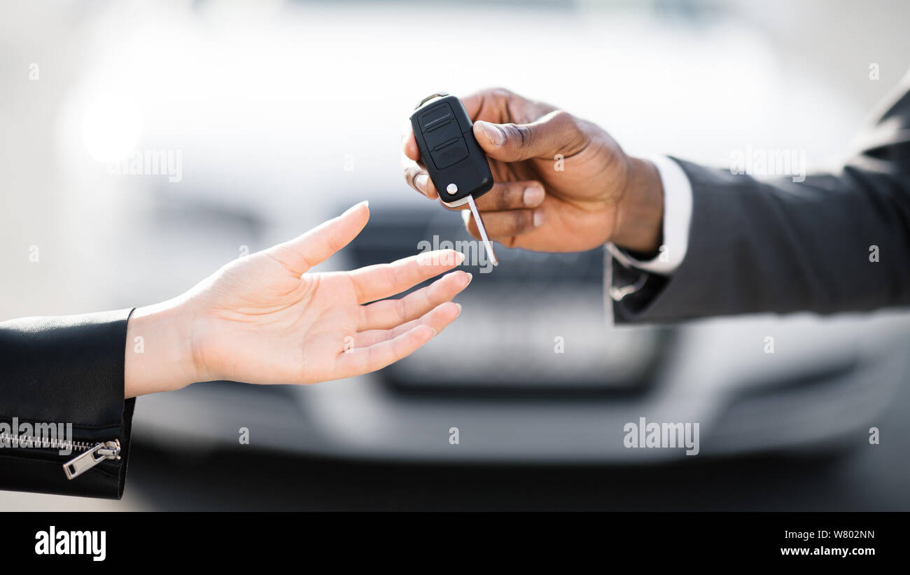 Car dealer giving key hi-res stock photography and images - Alamy