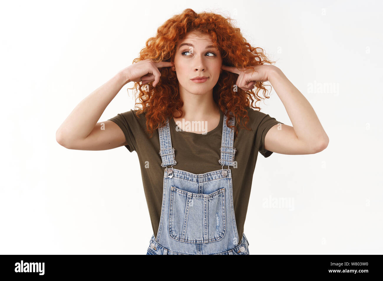 Silly Cute Redhead Curly Haired Girl Looking Unbothered And Uninvolved