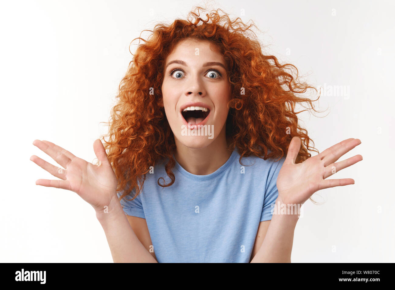Close Up Shot Emotive Attractive Redhead Curly Haired Woman Raising