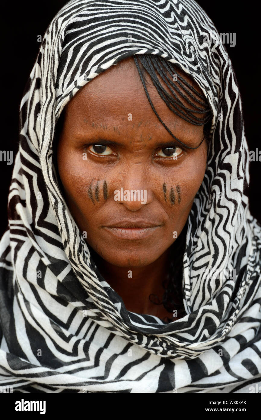 Head portrait of Afar tribe woman with facial tattoos / skin ...