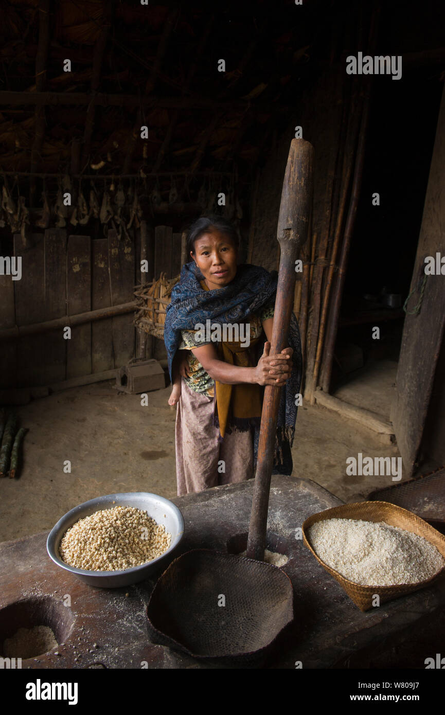 Pounding Rice High Resolution Stock Photography and Images - Alamy