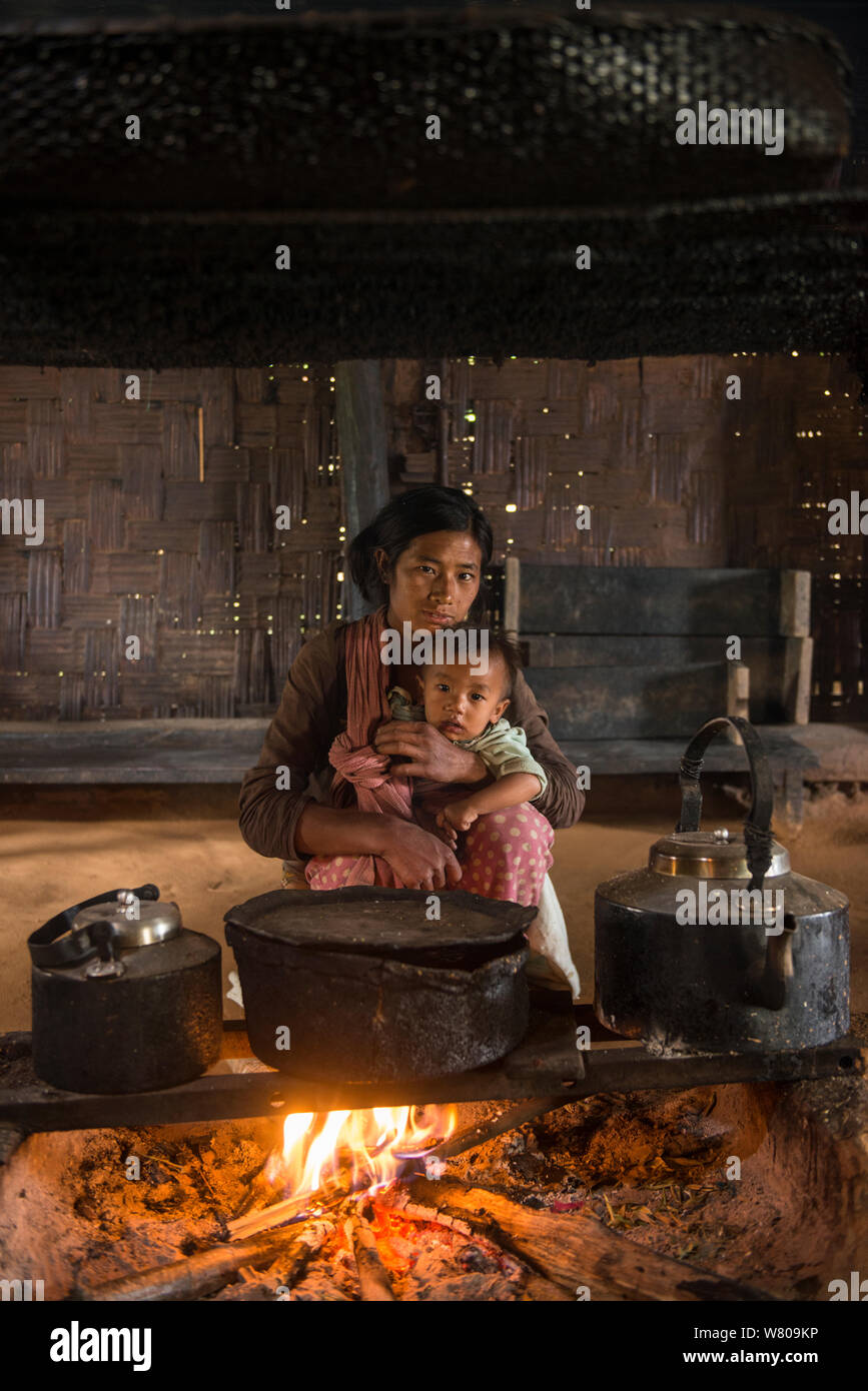 Chang Naga woman with baby, Chang Naga headhunting Tribe. Tuensang ...