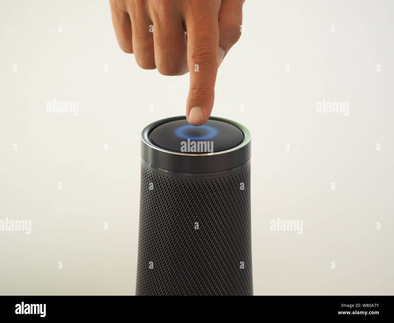 Cropped image of a man using a speaker with artificial intelligence ...