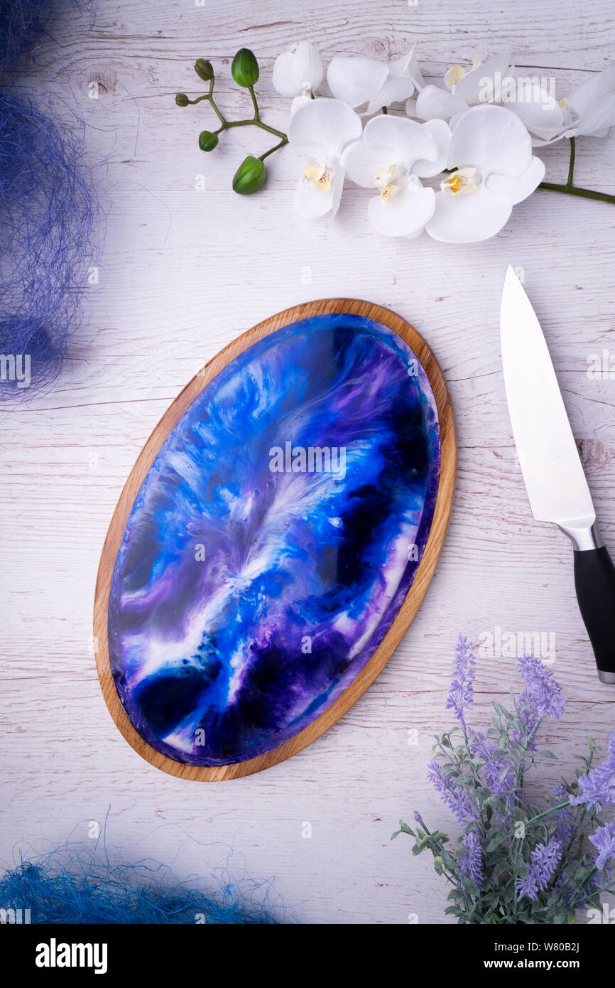 Odessa, UKRAINE - August. 10, 2019: Cutting board with marine abstract ...