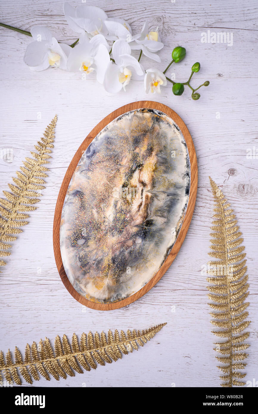 Odessa, UKRAINE - August. 10, 2019: Cutting board with marine abstract ...