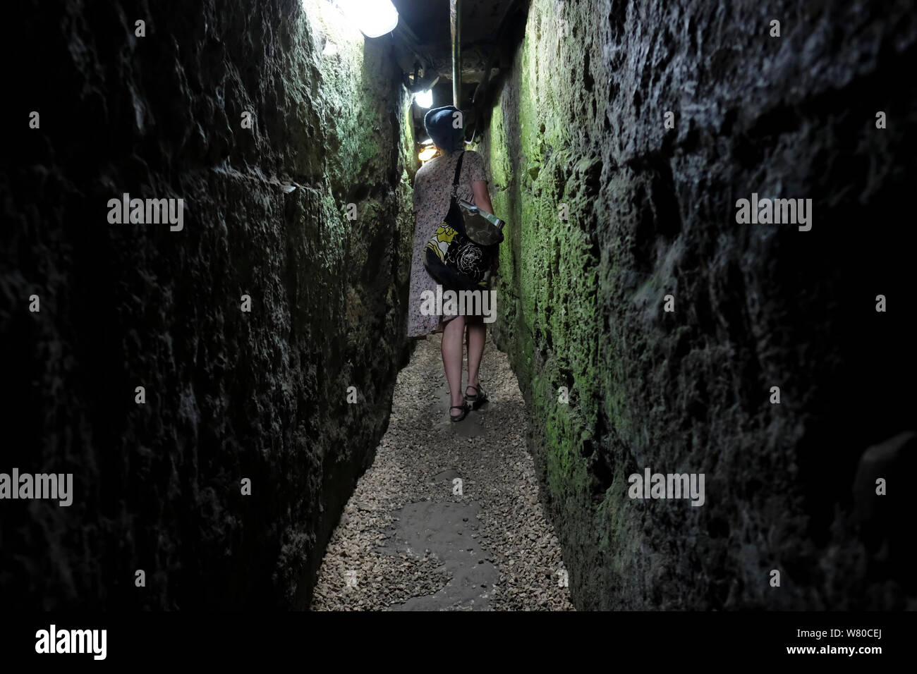 A Jewish visitor walks through the narrow path from the second temple ...