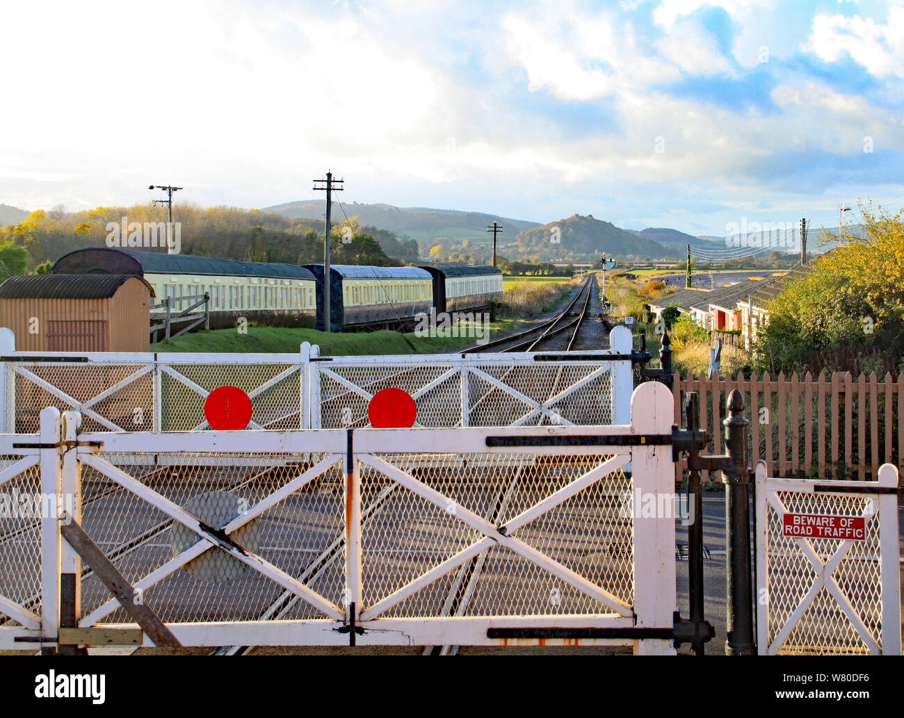 Level crossing by the station platform on the West Somerset heritage ...