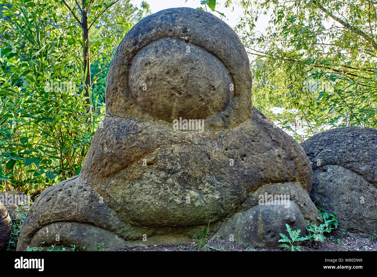 Petrified ammonite, which looks like an alien resident, against the ...