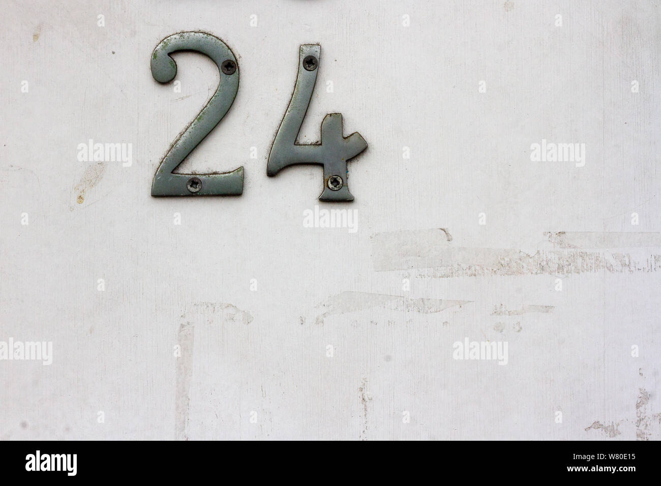 House number 24 on a white wooden front door Stock Photo - Alamy