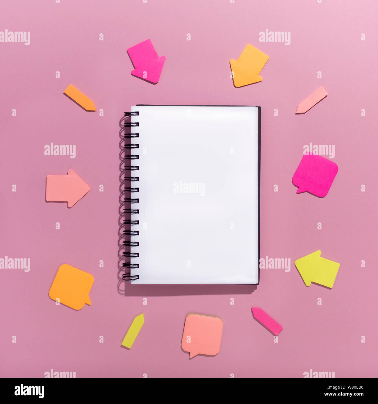 Stickers arrows showing promotion on notepad with blank space Stock ...