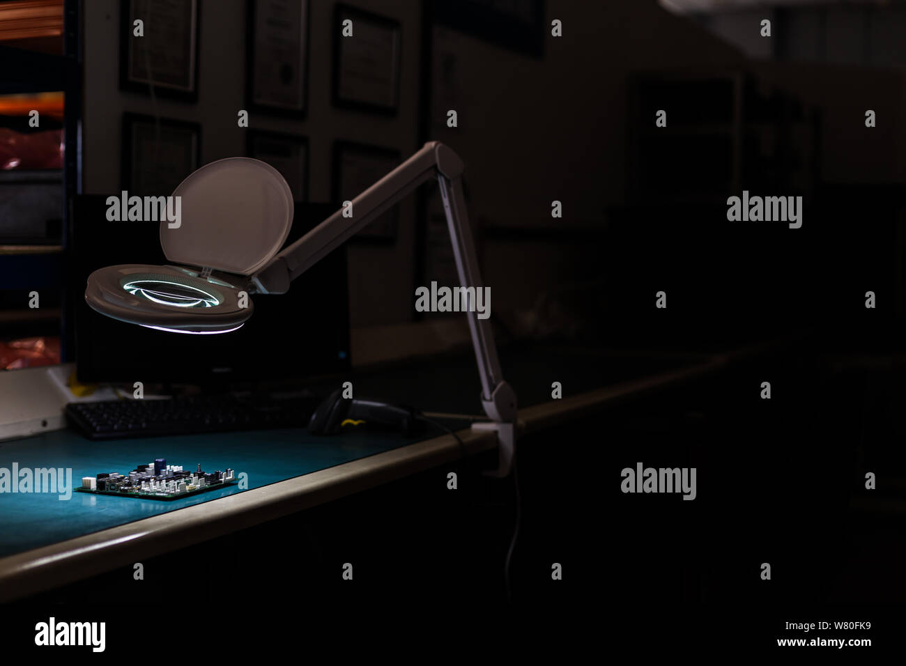 Quality control station in an electronics manufacturing factory. There ...