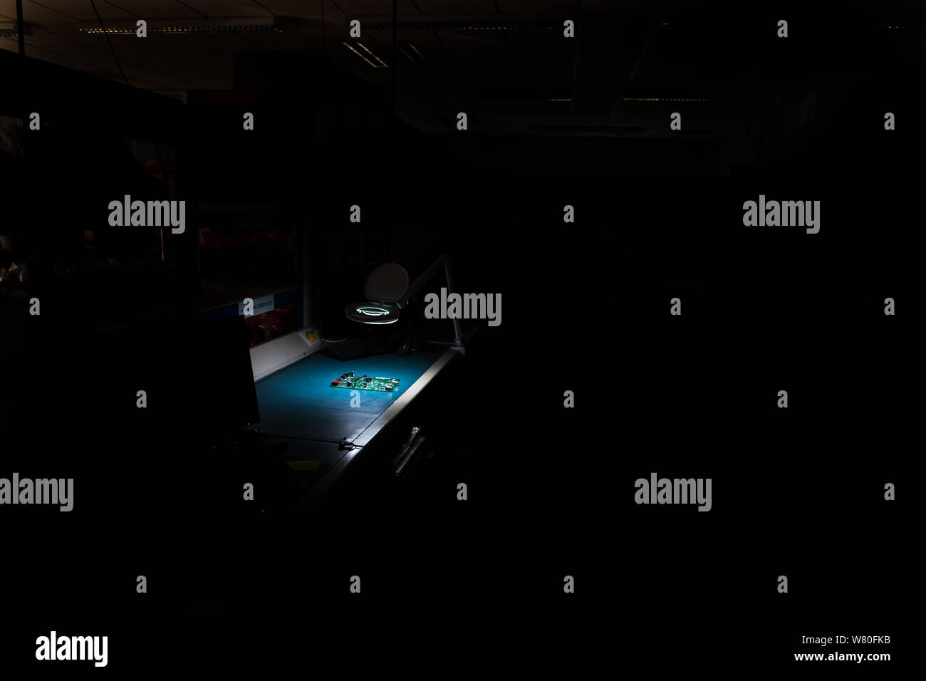 Quality control station in an electronics manufacturing factory. There ...