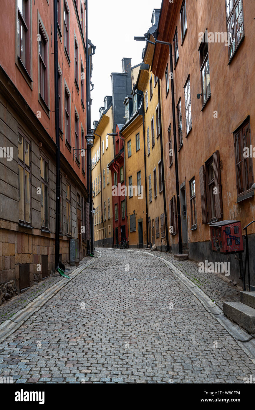Vertical photo of an empty side street in the Old Town section of ...