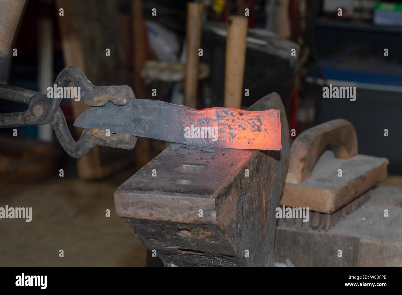 This piece of hot metal is being forged into shape to one day be a ...