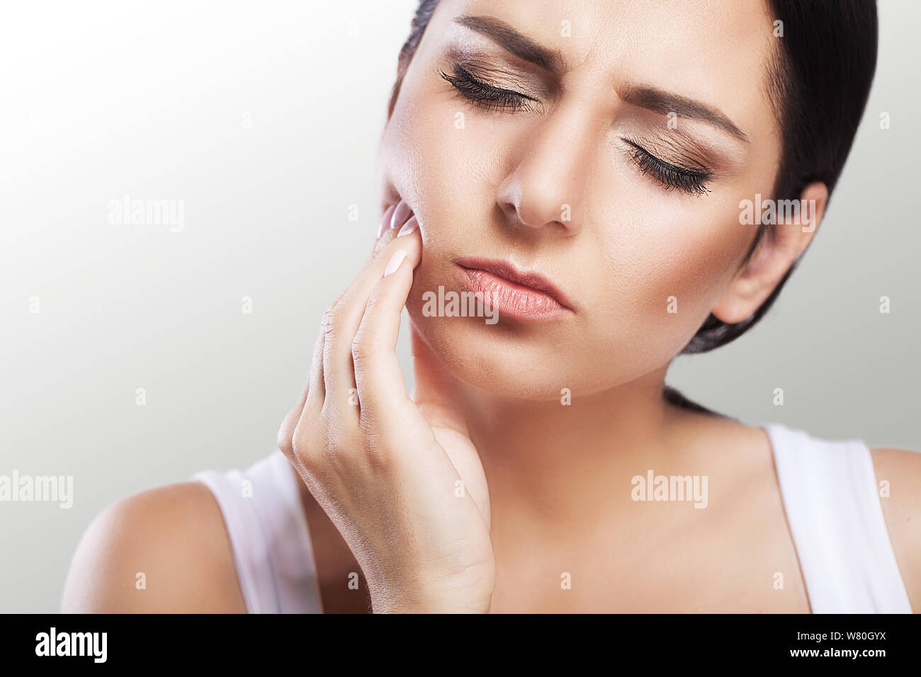 pain. Teeth Problem. Woman Feeling Tooth Pain. Closeup Of A Beautiful ...