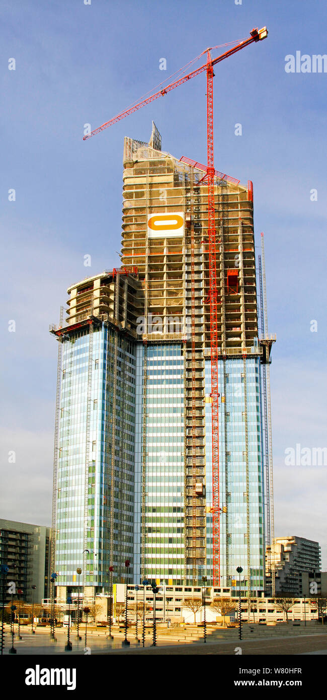 Skyscraper during construction in progress at sunny afternoon Stock ...