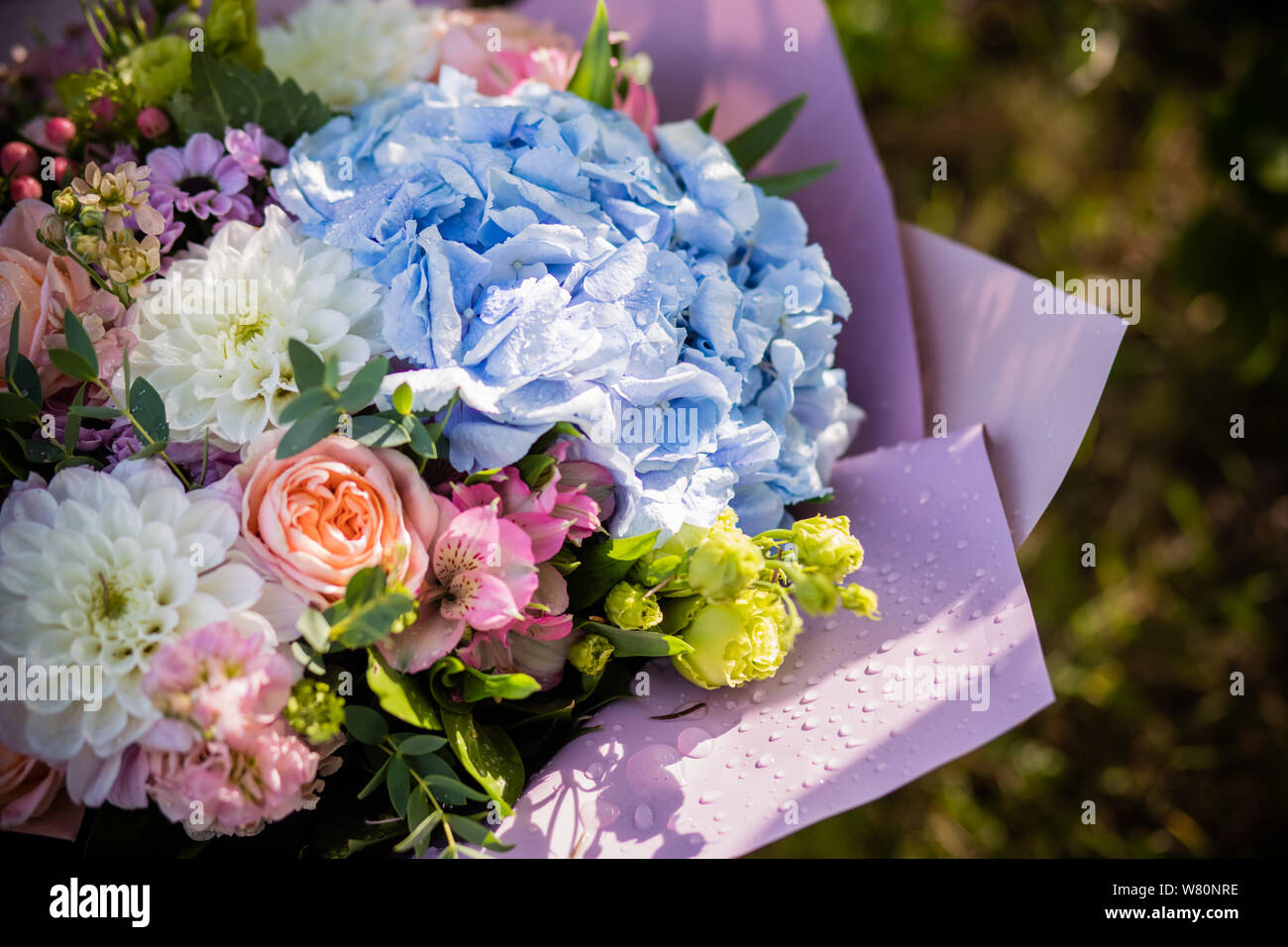 beautiful blossoming flower bouquet of fresh hydrangea, roses, eustoma ...