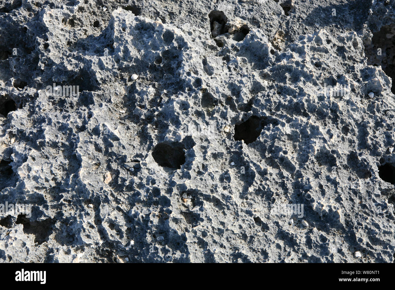 full frame image of a rocky volcanic outcrop Stock Photo - Alamy