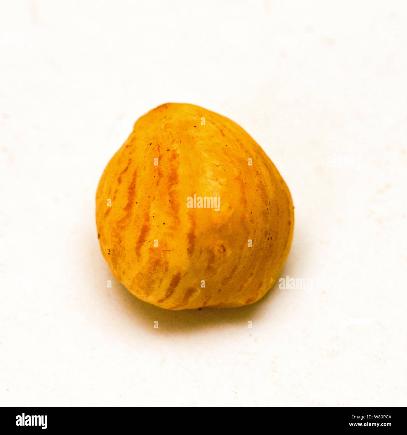 One natural organic raw hazelnut without shell Stock Photo - Alamy