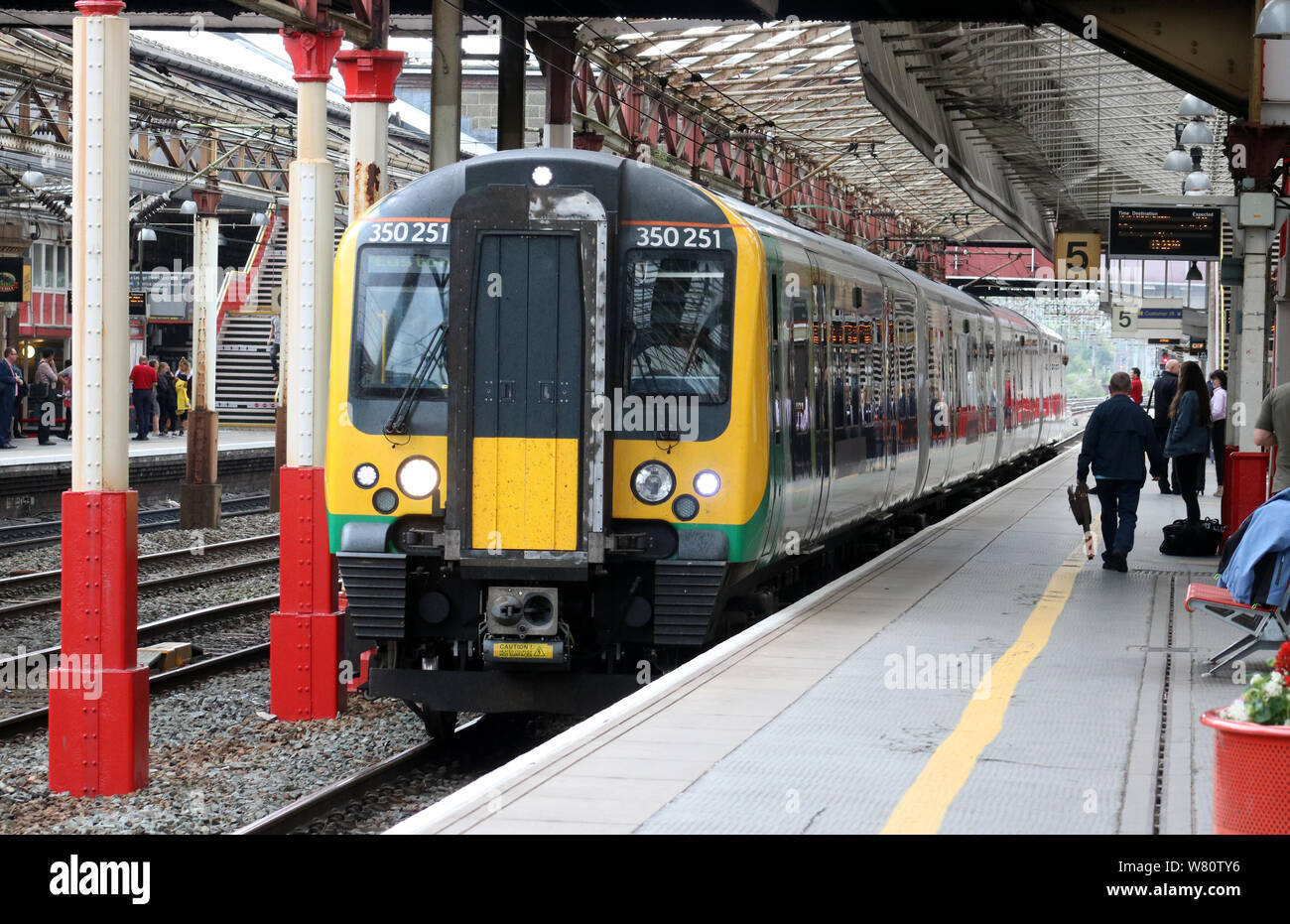 Siemens Desiro class 350/2 emu in London Midland livery leaving platform 5 at Crewe on the WCML ...