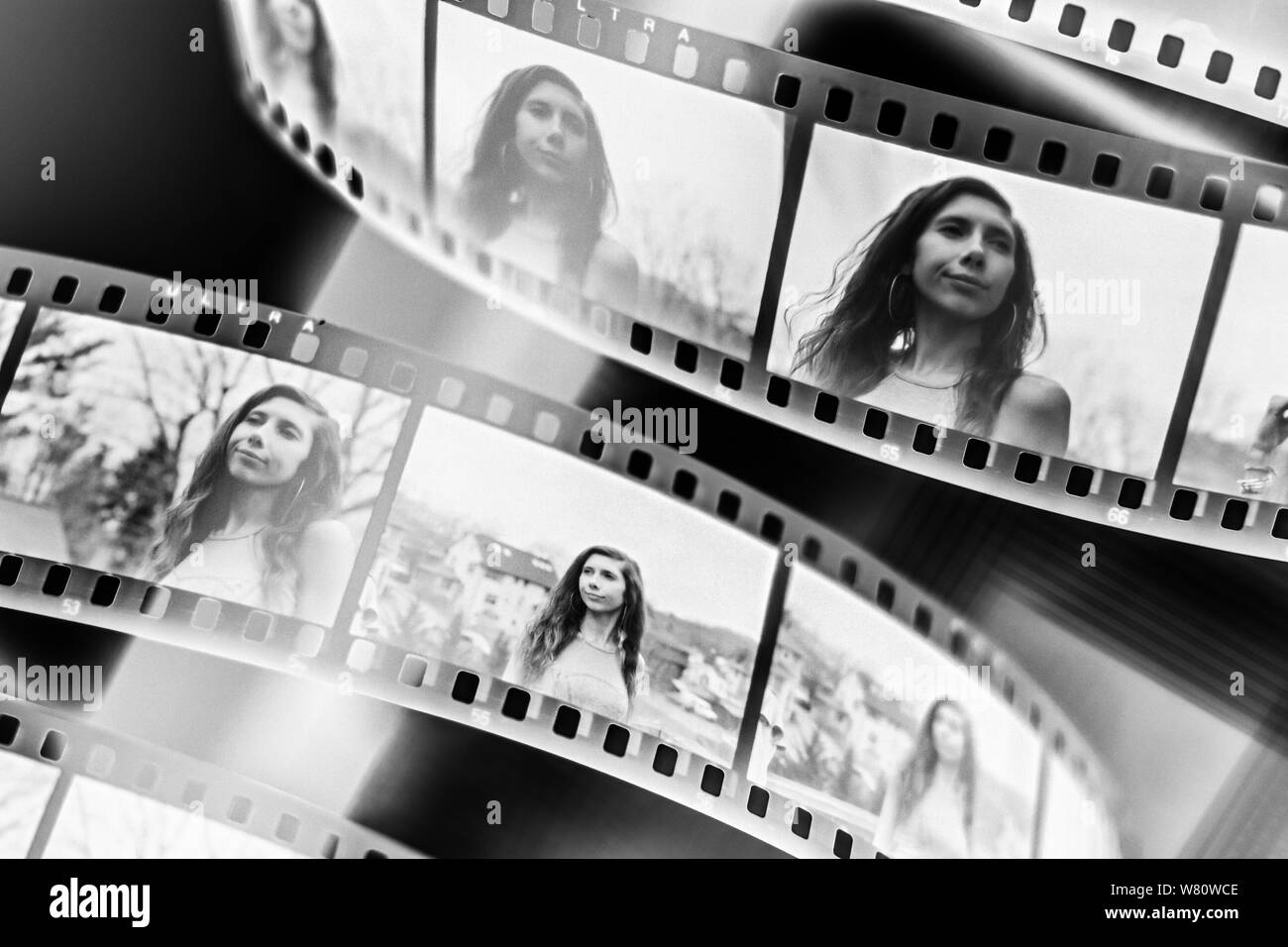 Wiped down with a solution of rubbing alcohol, strips of film negatives ...