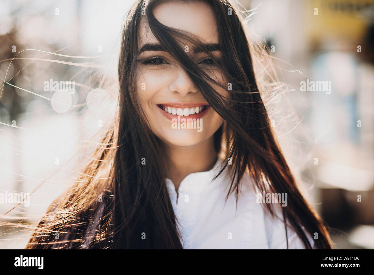 Close up portrait of a amazing long haired girl looking at camera ...