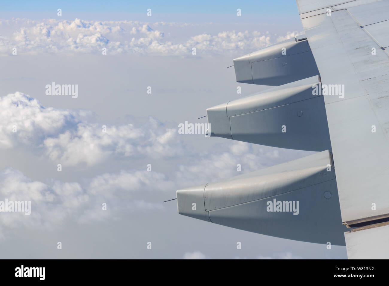 Clear deep blue sky over thick layer of blurry clouds at stratosphere ...