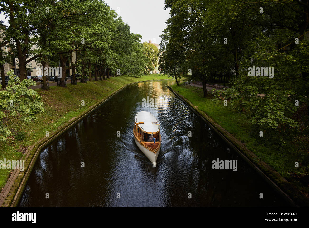 A tourist boat is seen on the City Canal in Riga.Riga is the capital ...