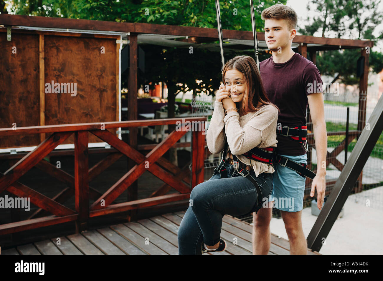Charming young caucasian female looking scared biting her lips before ...