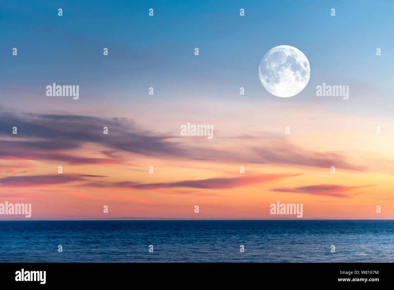 FULL MOON OVER SEA Stock Photo - Alamy