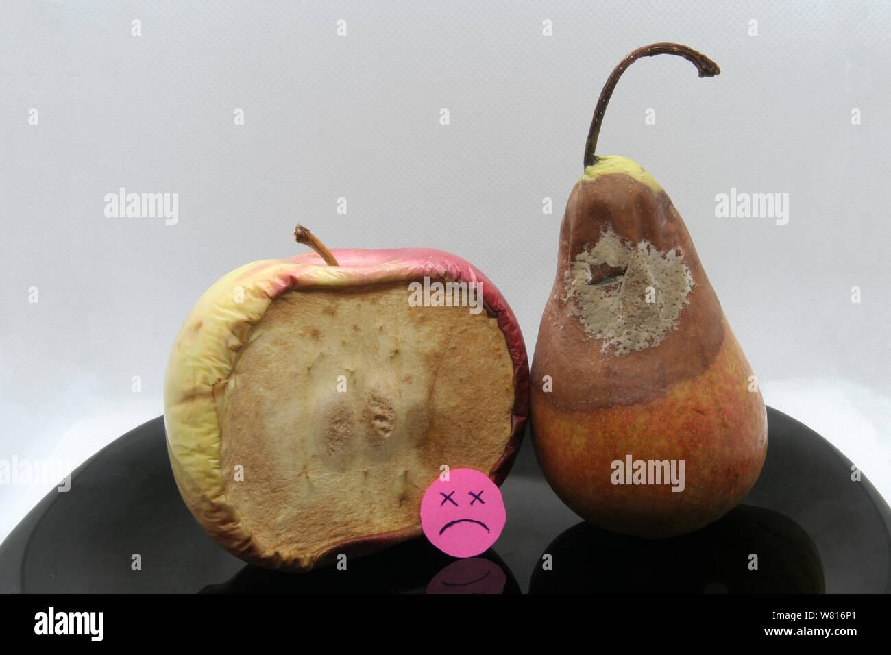 Bad fruit. Bad apple and pear. Molded fruit. Molded apple and pear ...