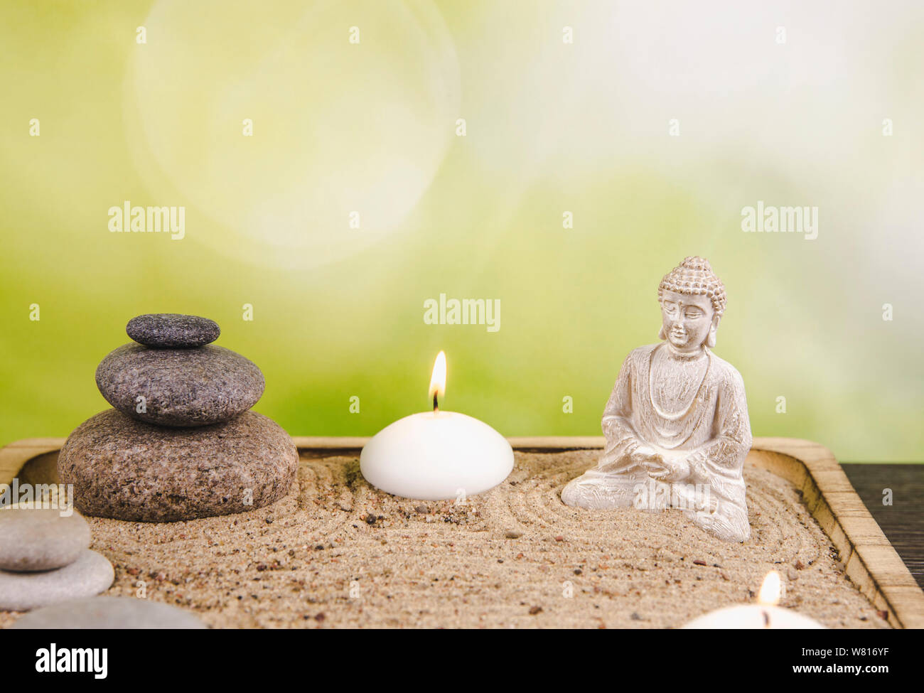 Miniature desk zen sandbox with Buddha figure sit in Lotus position ...