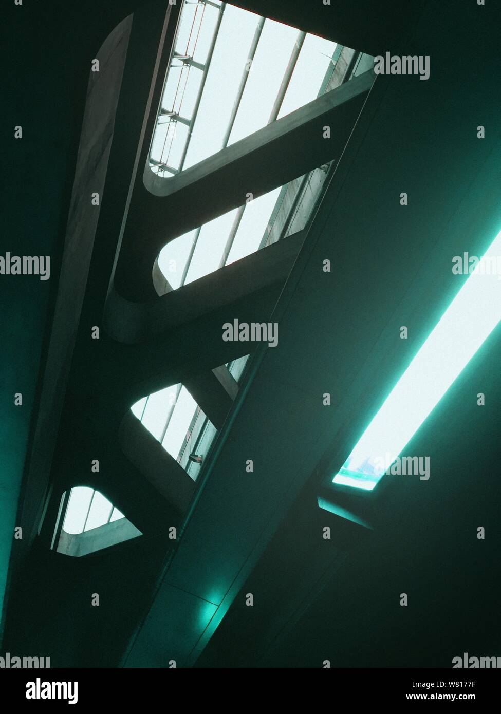 Vertical shot of a modern ceiling with neon light on the side - cool ...