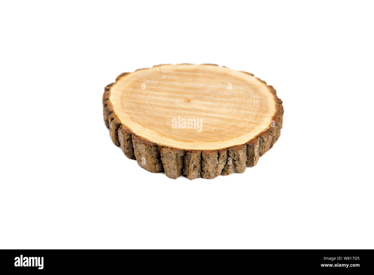Flat lay view of natural pine tree slice with bark, isolated on white ...